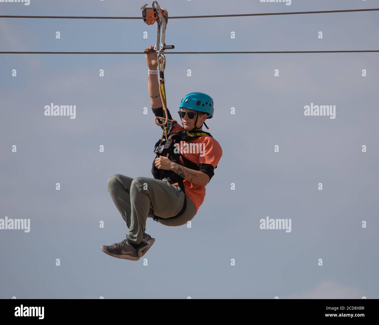 People ride The Zip Wire in Brighton, East Sussex, UK Stock Photo - Alamy