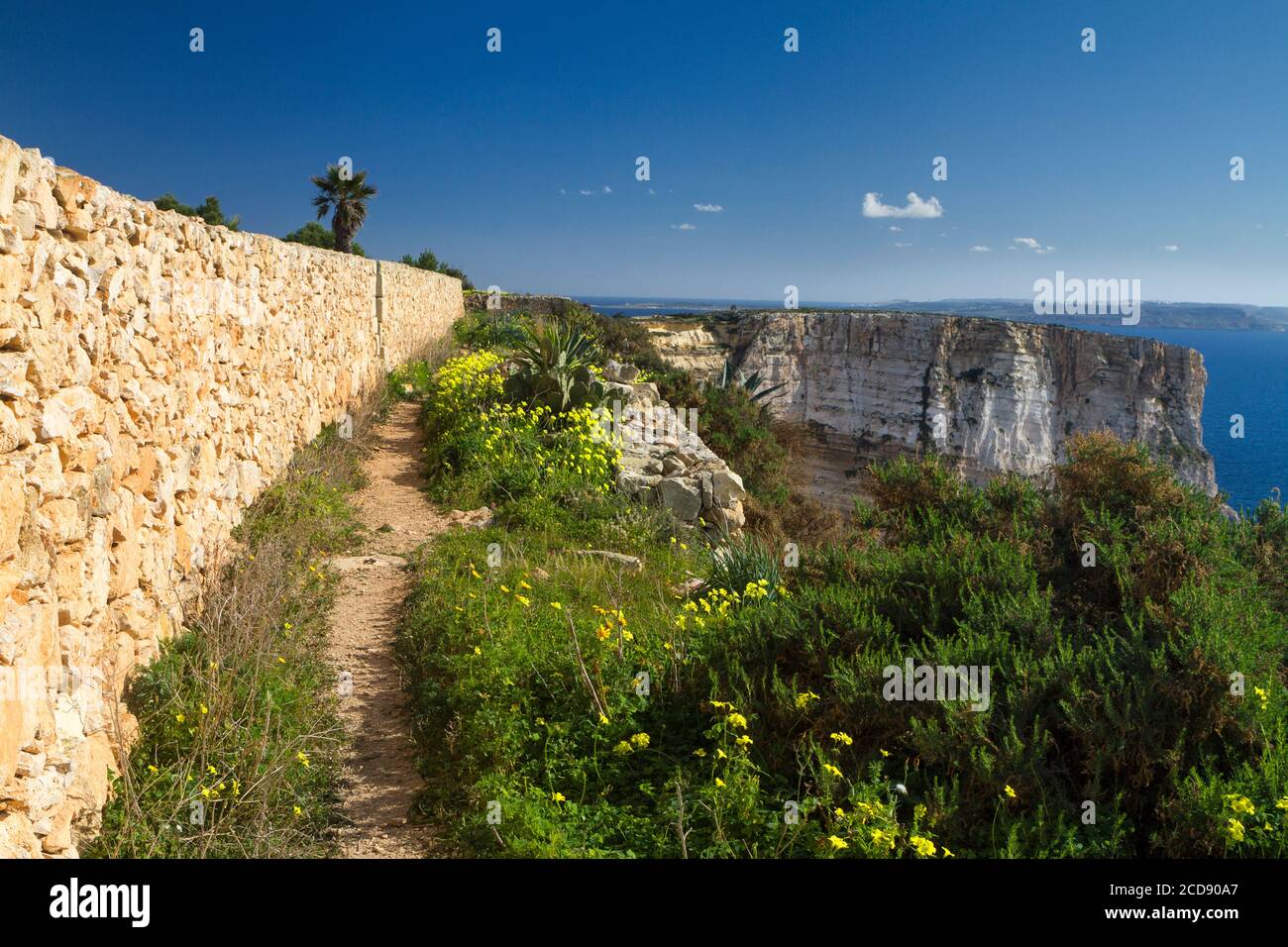 A narrow path on limestone cliffs on Gozo Island, Malta Stock Photo - Alamy