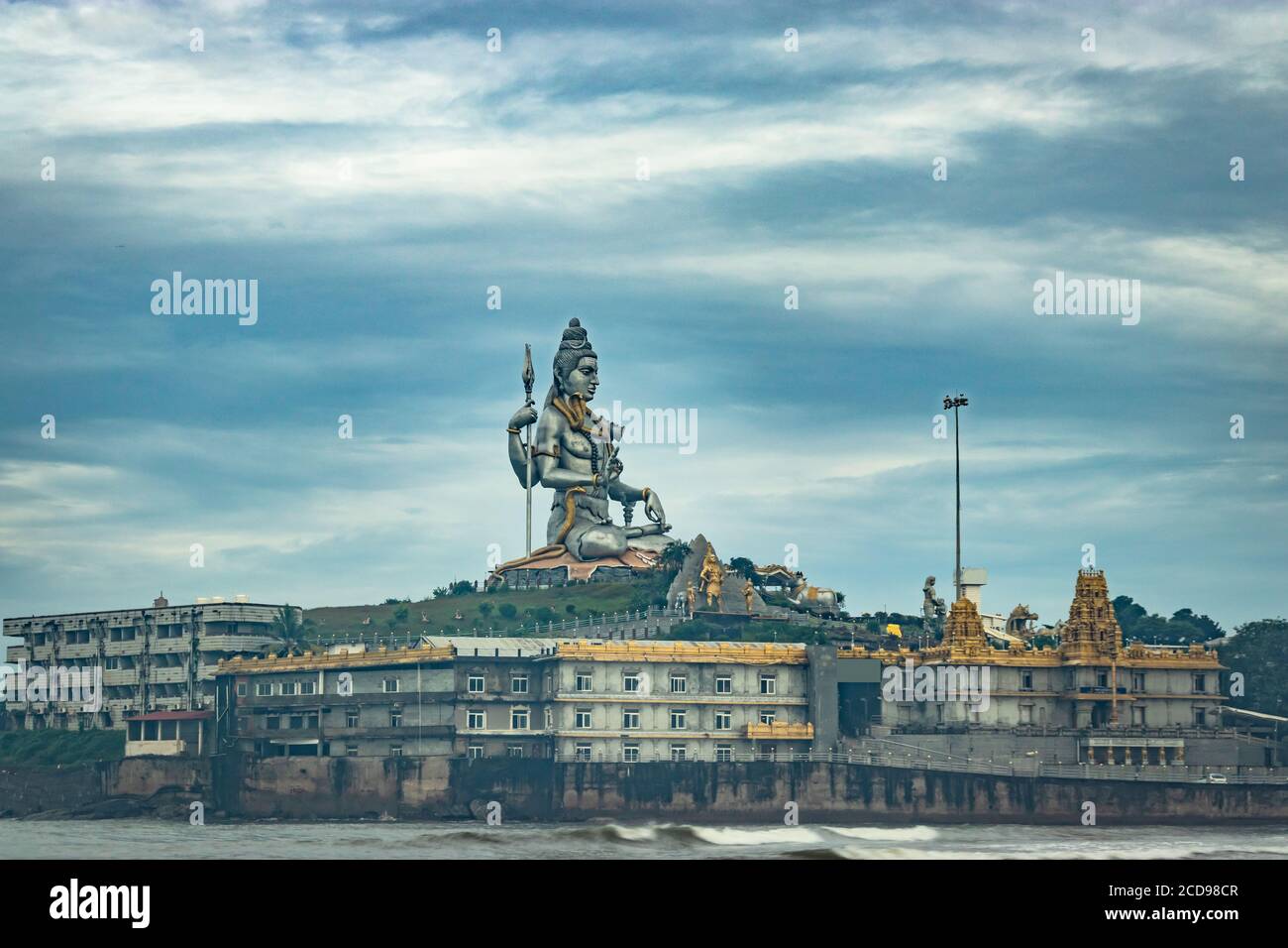 murdeshwar shiva statue morning view from low angle with sea waves ...