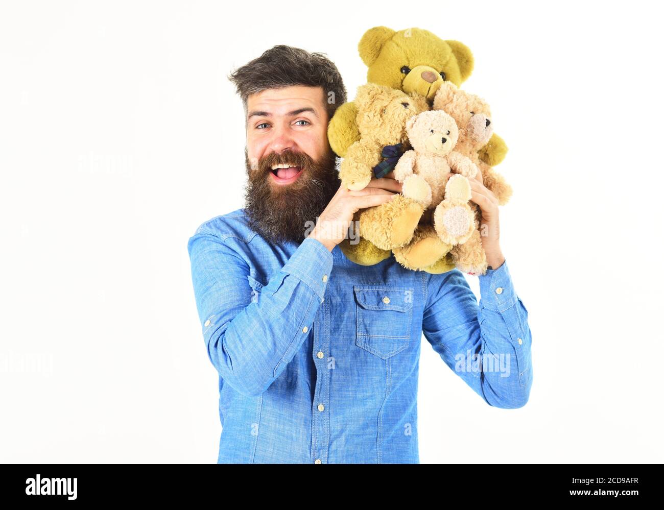 Man holds teddy bears on white background. Pretty toy concept. Man with ...