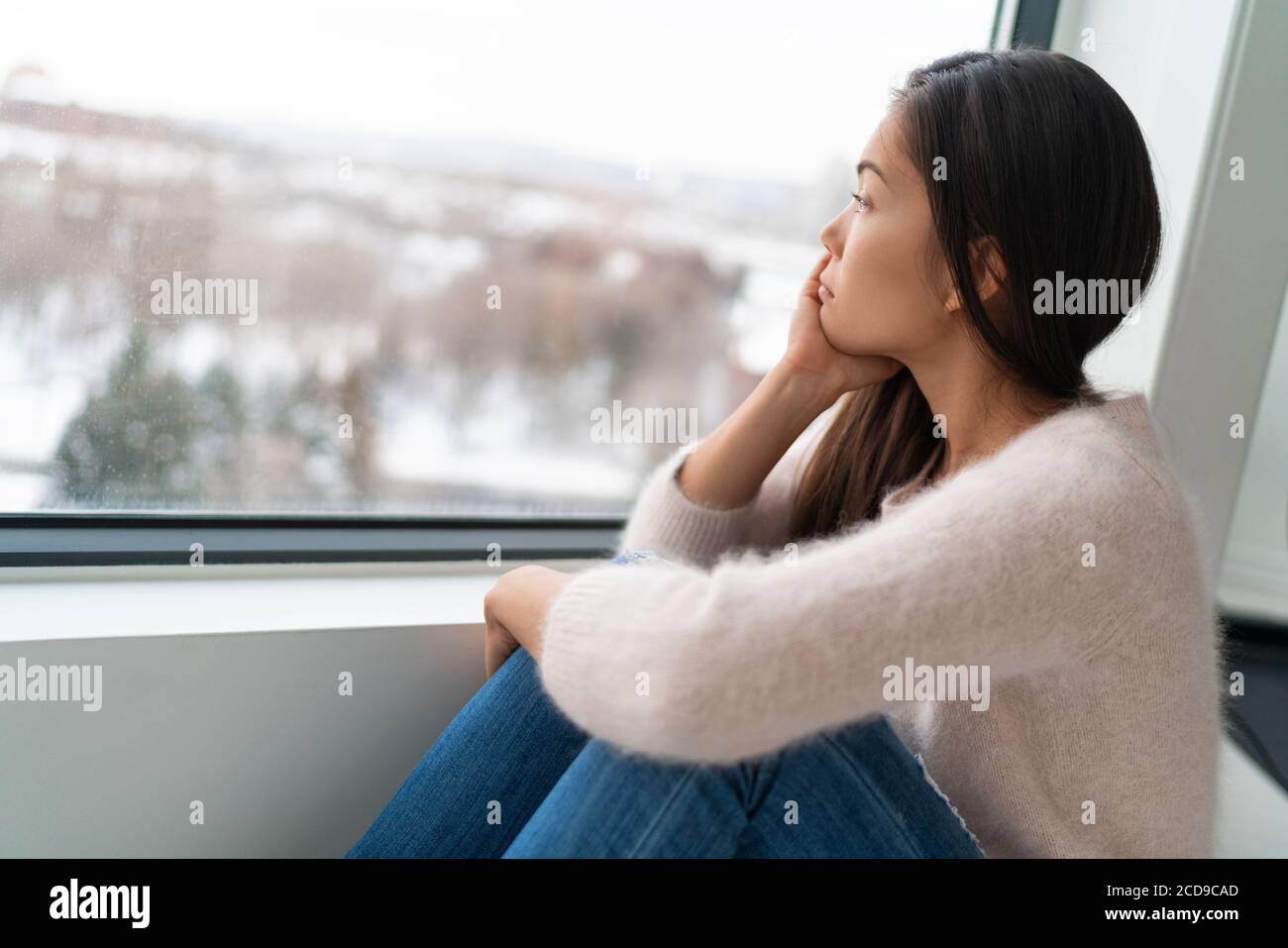 Winter seasonal affective disorder SAD depression mood alone Asian girl ...