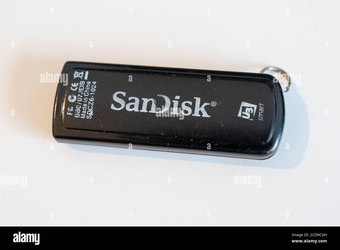 Close-up of usb drive with SanDisk logo on white background, San Ramon ...