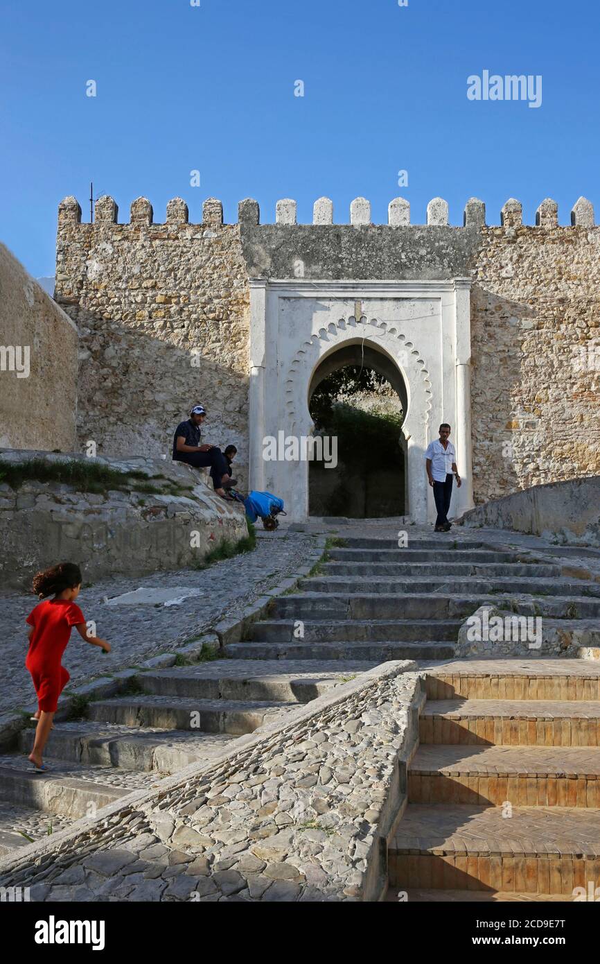 Morocco, Tangier Tetouan region, Tangier, girl climbing stairs near a ...