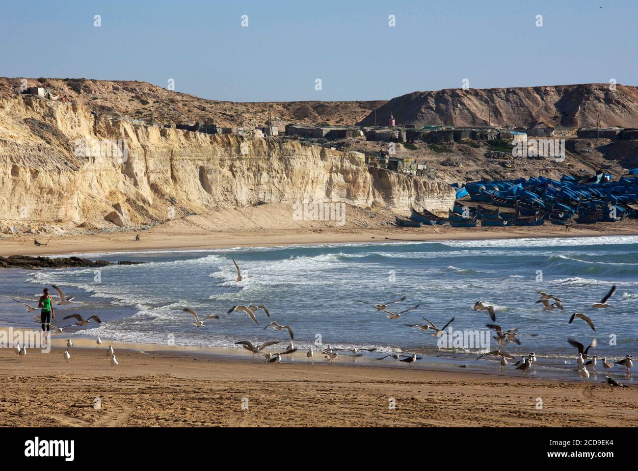 Fishing boats on a beach in western sahara hi-res stock photography and ...