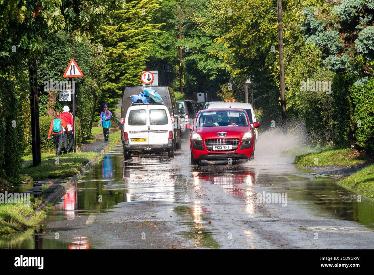 Weather: Heavy rain from thunderstorm. Traffic slowing down for ...