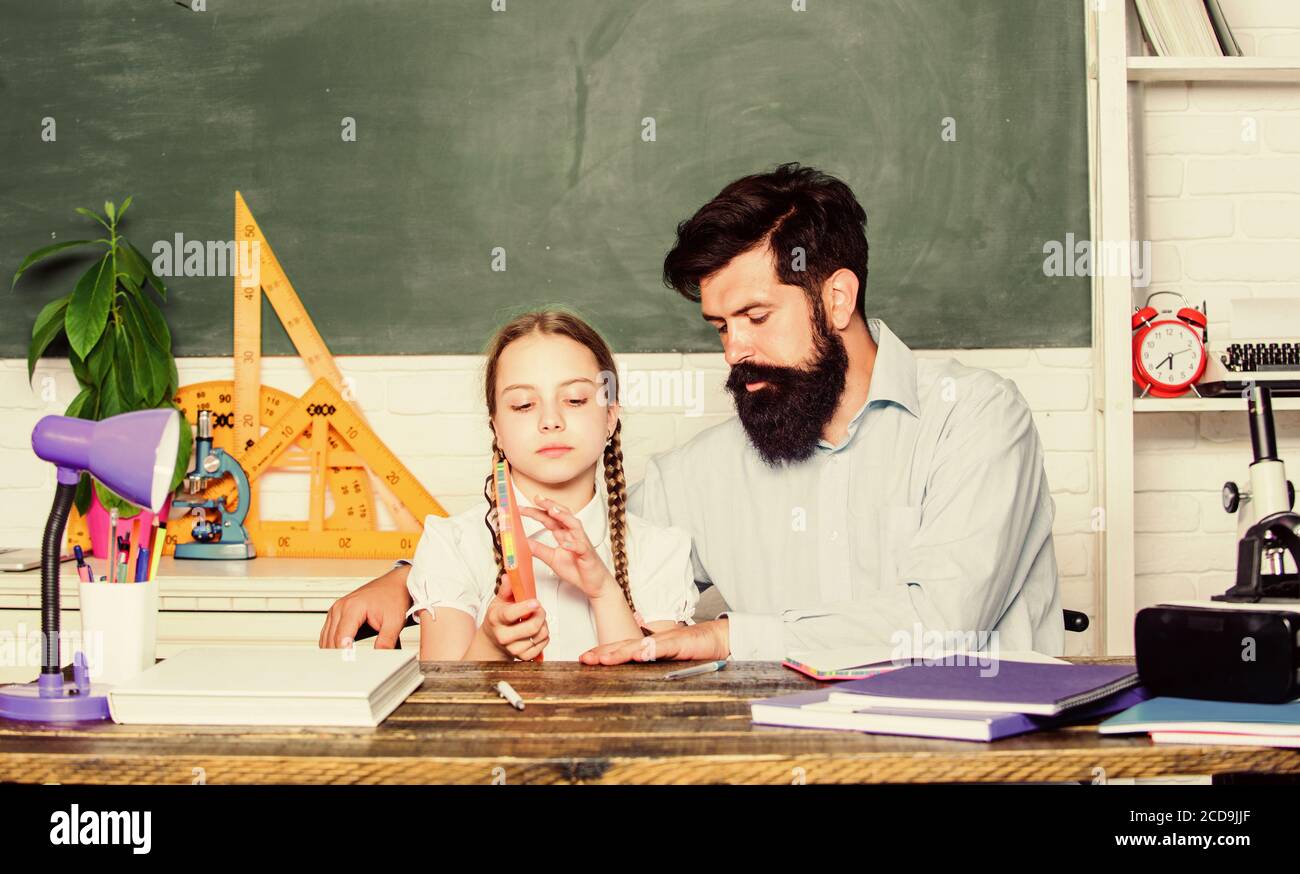 Fascinating lesson. Explaining science to child. School teacher and ...
