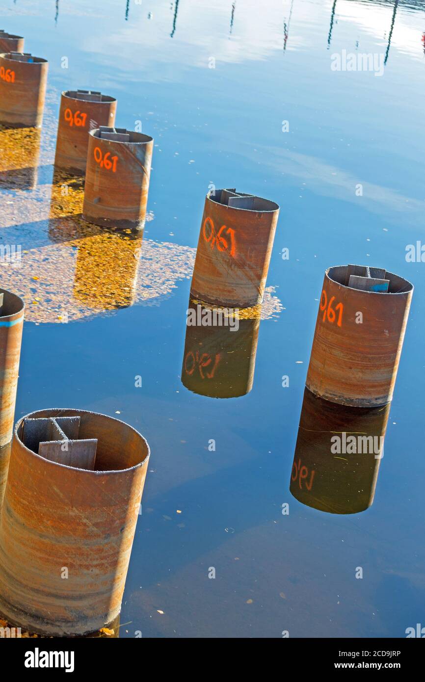 Steel Pipes With Beam Support in Water Construction Stock Photo - Alamy