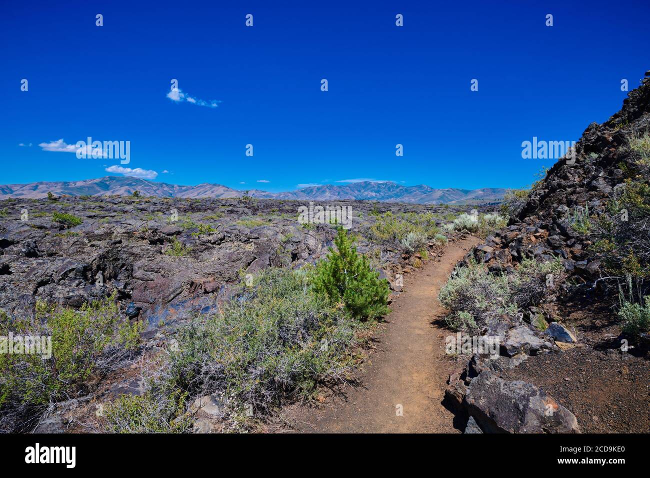 Hiking trail by lava flows at Craters of the Moon National Park Stock ...