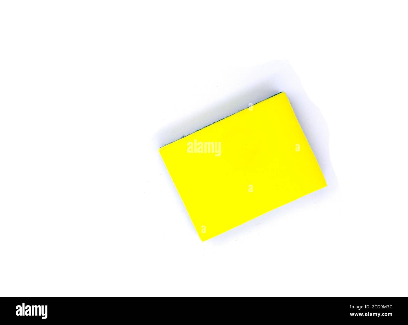 New yellow sponge for dish or car washing. Cleaning sponge top view ...