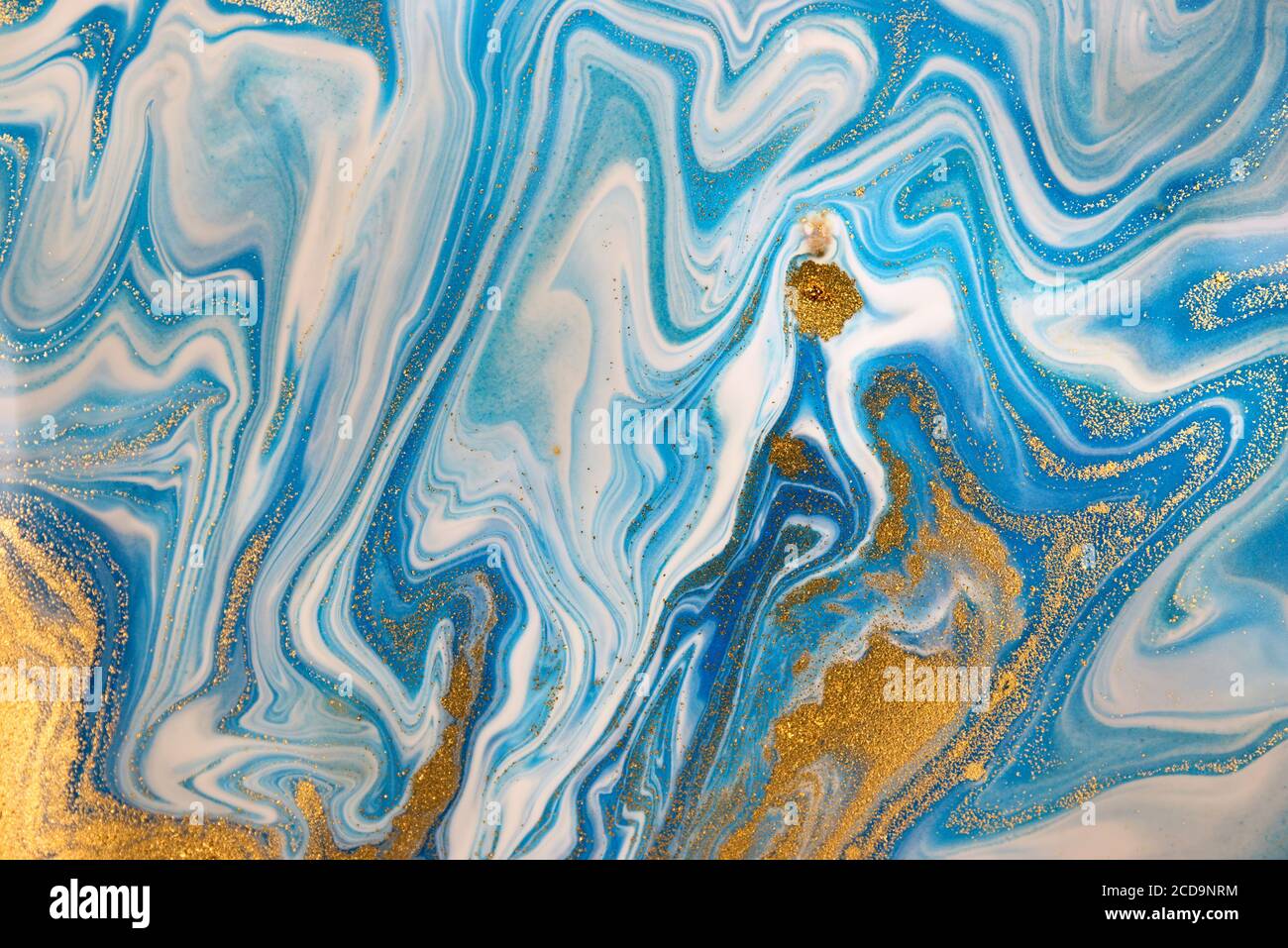Blue wave pattern with layers of gold sequins Stock Photo - Alamy