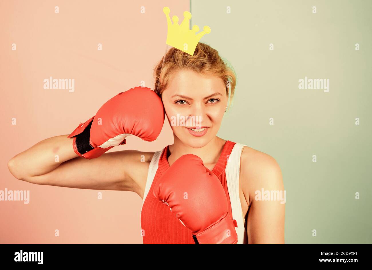 Celebrate success. Queen of boxing ring. Sportswoman with princess ...