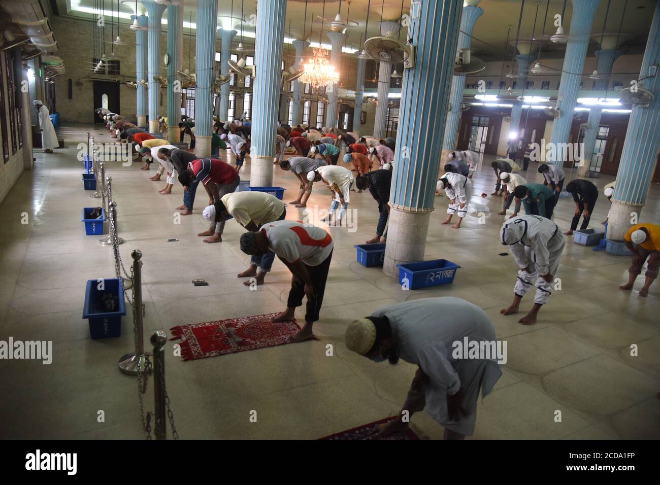 Muslims take prayer as they maintain social distancing at Baitul ...