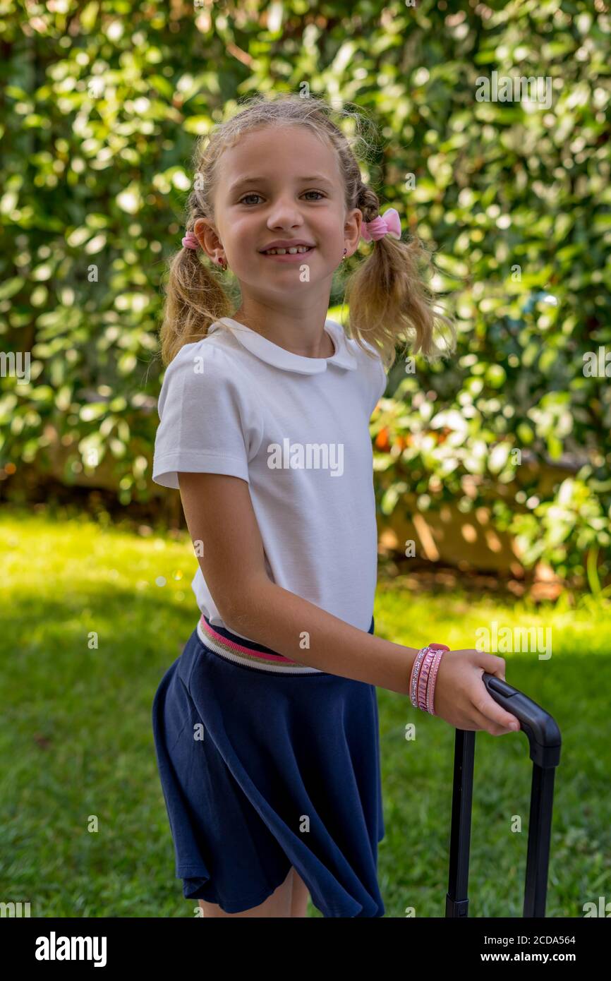 Portrait of happy caucasian young girl going to school. Closeup face of ...