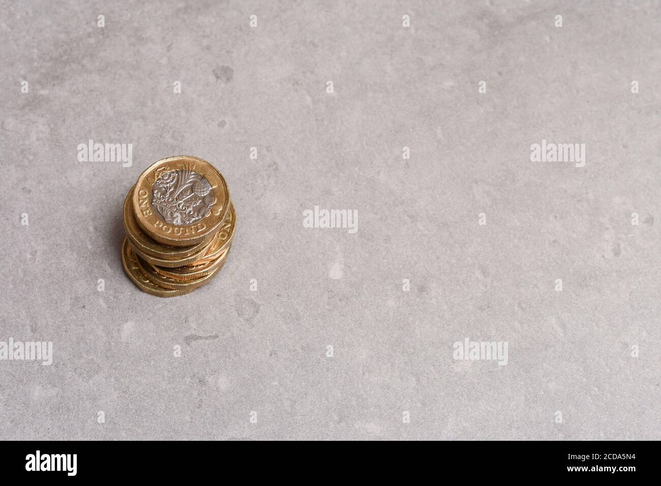 New pound coins from english sterling currency in a pile Stock Photo ...