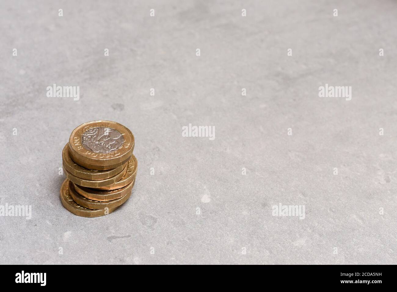 New pound coins from english sterling currency in a pile Stock Photo ...