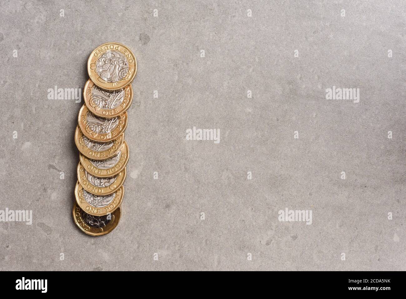 New pound coins from english sterling currency in a pile Stock Photo ...