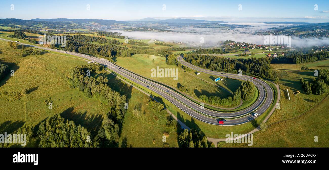 Poland. Wide panorama of a winding switchback road from Krakow to ...