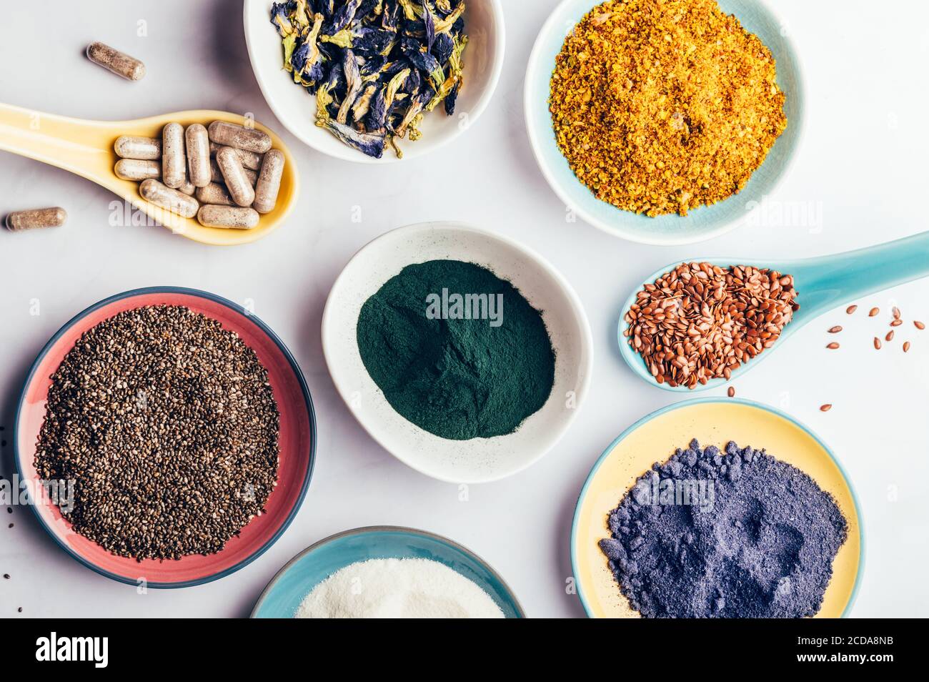 Variety of healthy food supplements Stock Photo - Alamy