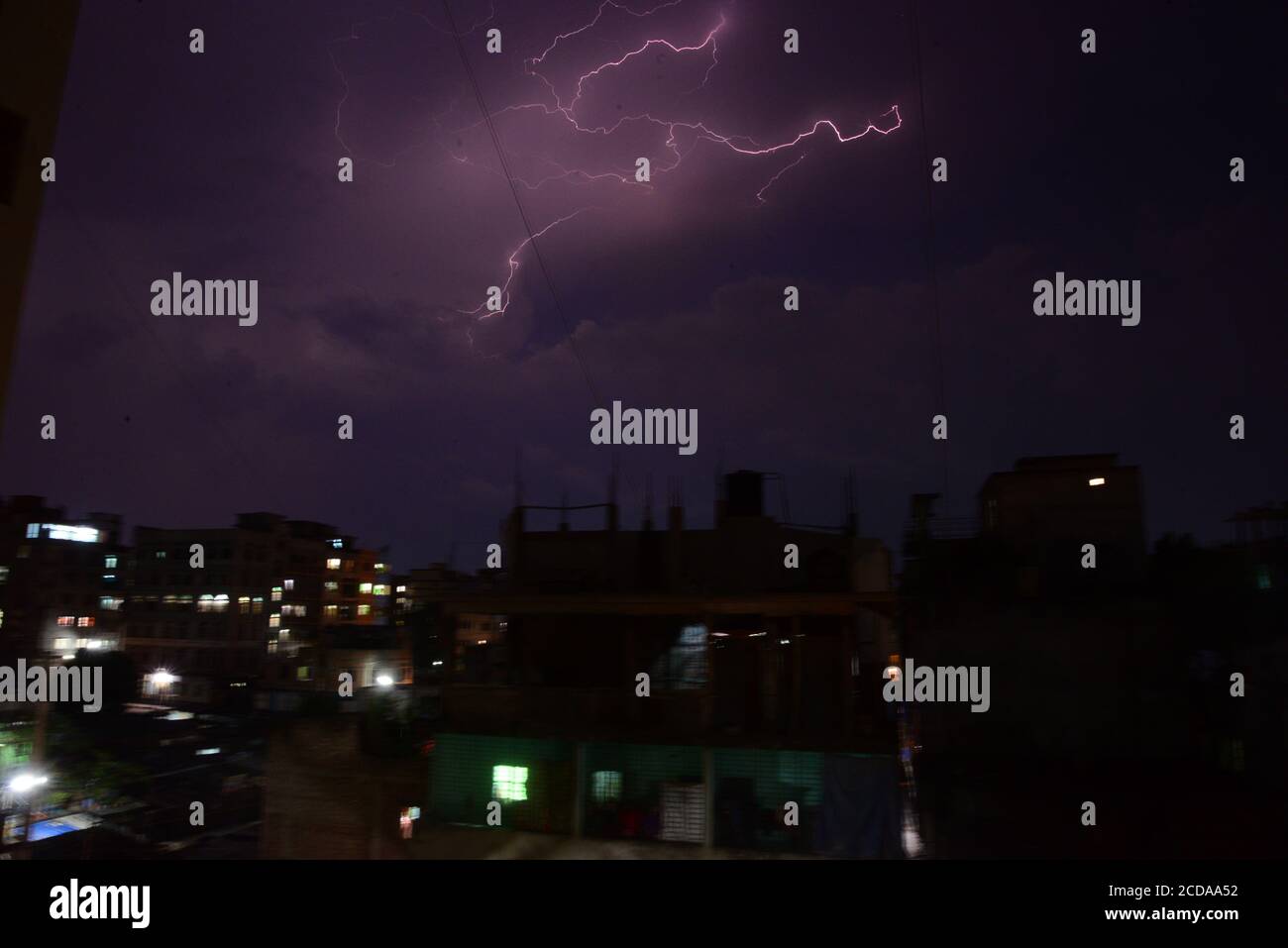 Lightning flashes in the sky over the Dhaka City during a storm in Bangladesh, on April 18, 2020 ...