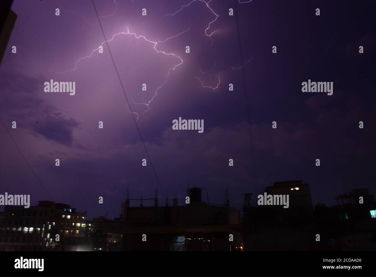 Lightning flashes in the sky over the Dhaka City during a storm in Bangladesh, on April 18, 2020 ...
