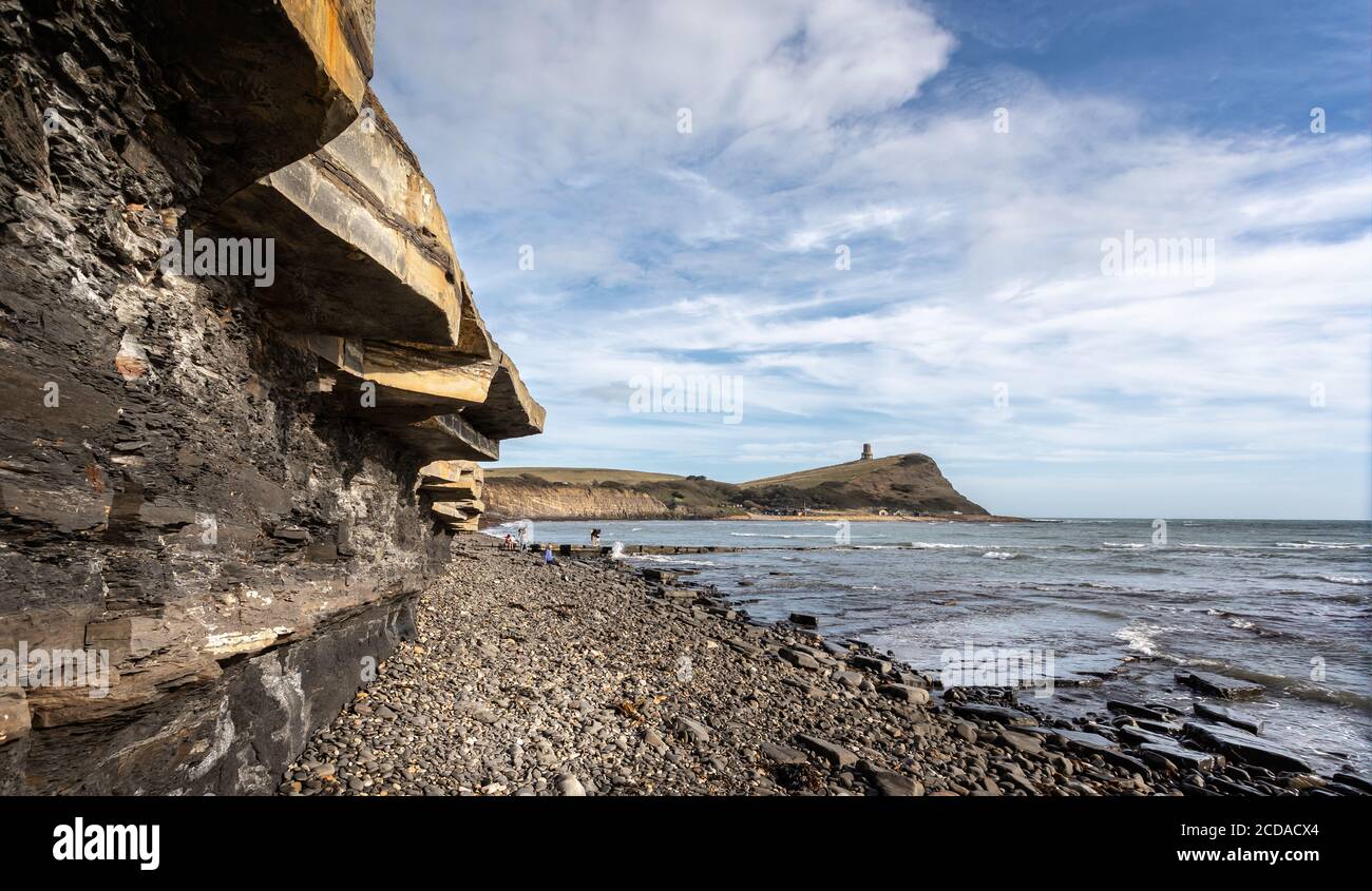Kimmeridge Bay with rocky shore line and shale and limestone cliffs ...