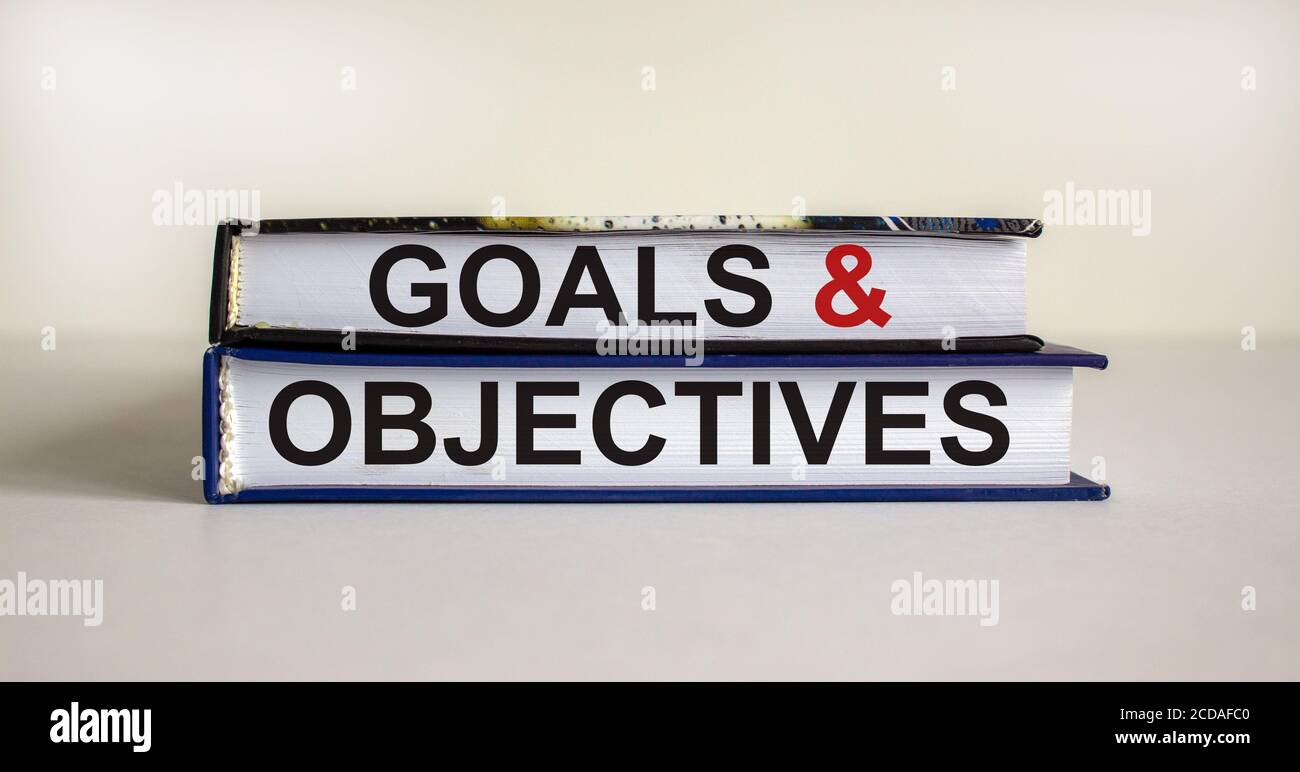 Books with text 'goals and objectives' on beautiful white background ...