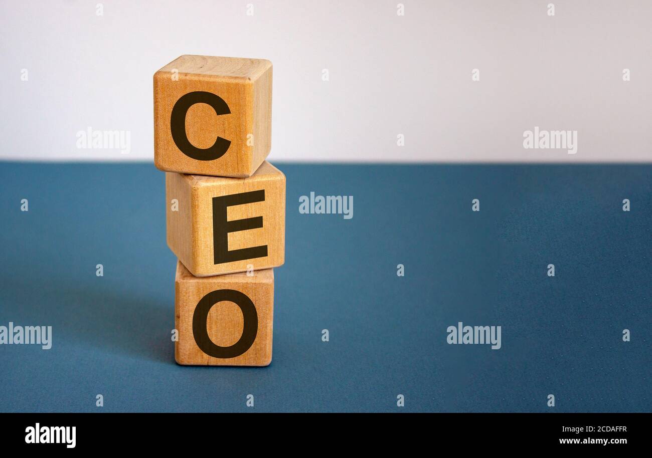Concept word 'CEO' on cubes on a beautiful blue background. Business ...