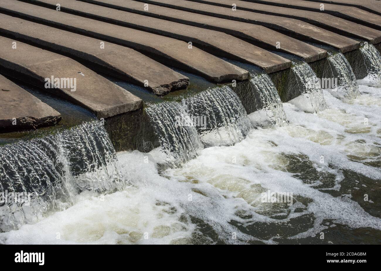 Detail of the manmade concrete dam with falling water in Aurora ...
