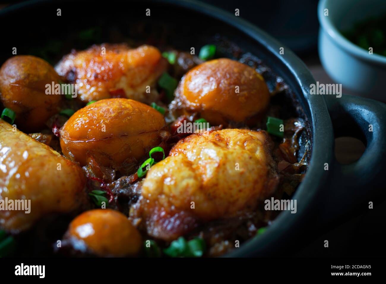 preparing chicken with pequi at home, local food of Brazil Stock Photo ...