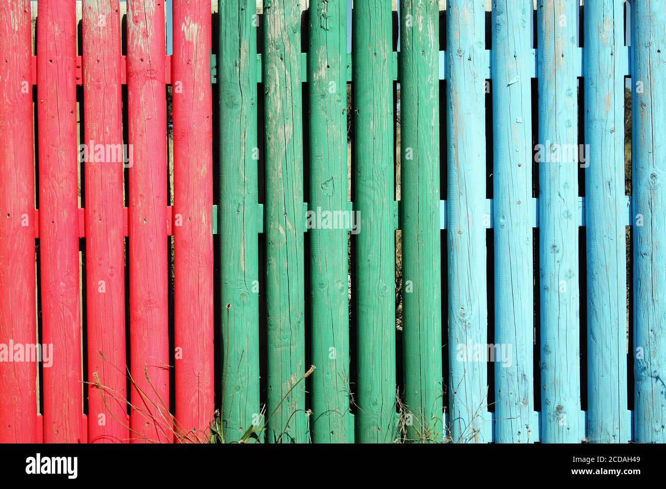 Multi coloured wooden stake plank boards fun wood background stock ...