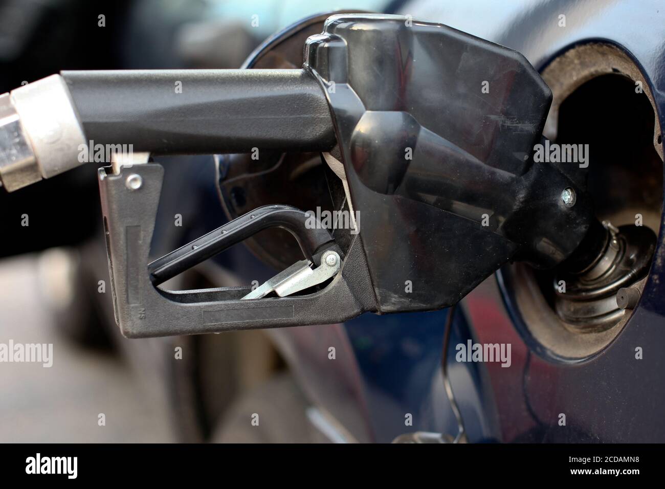 Loading car with gasoline on gasstation Stock Photo - Alamy