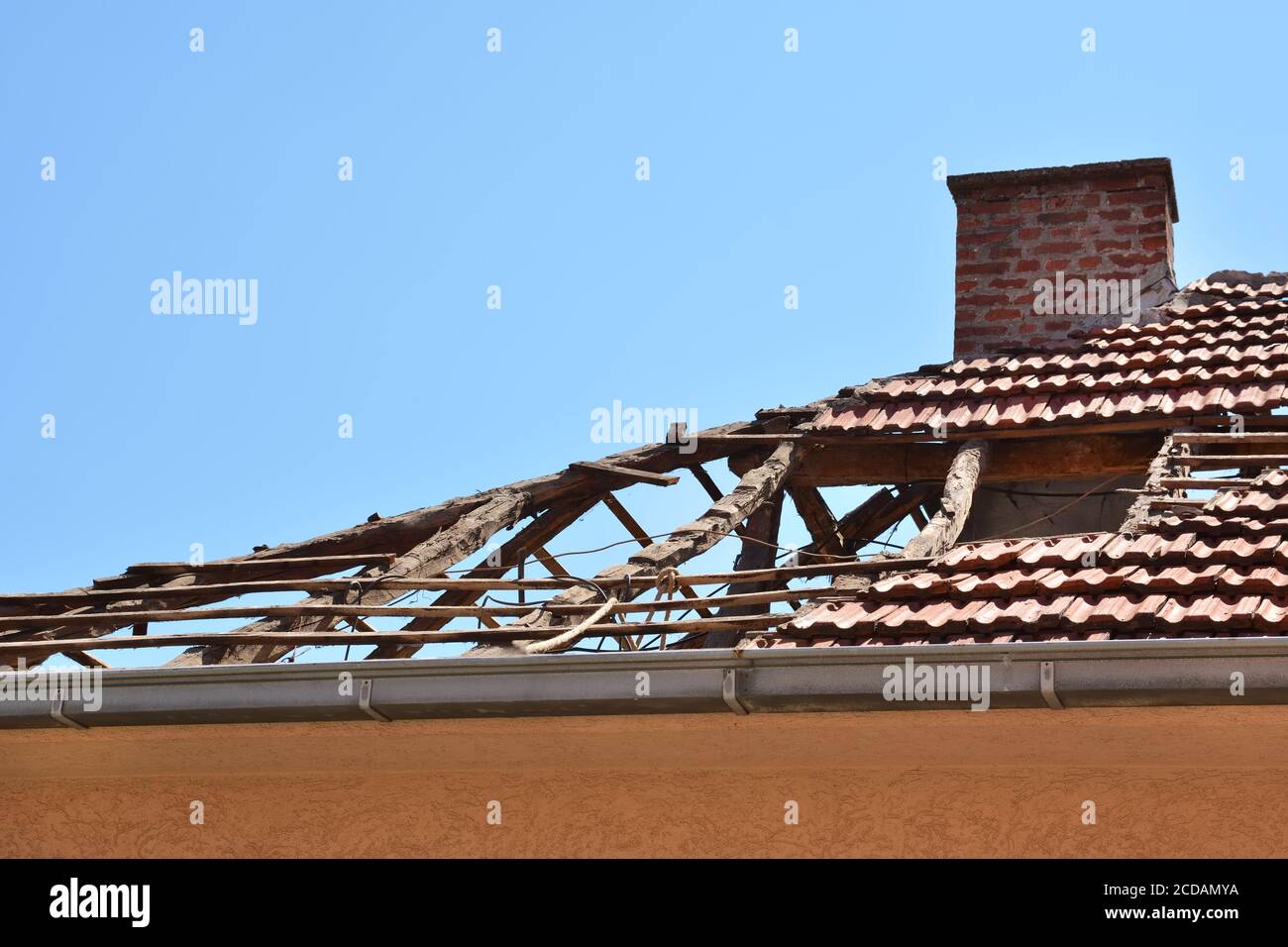 Damaged roof hi-res stock photography and images - Alamy