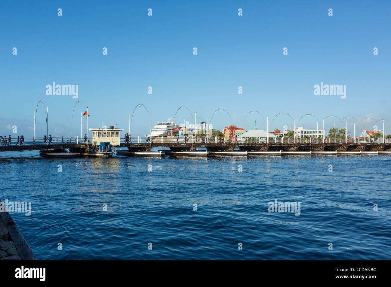 The Queen Emma Bridge is a swinging pontoon bridge originally built ...