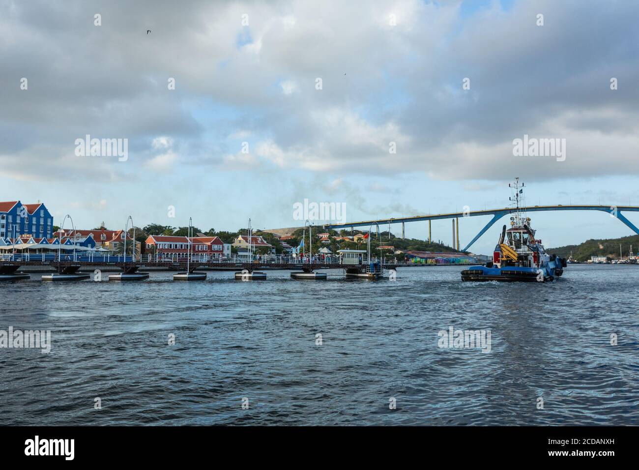 The Queen Emma Bridge is a pontoon bridge across the St. Anna Bay that ...