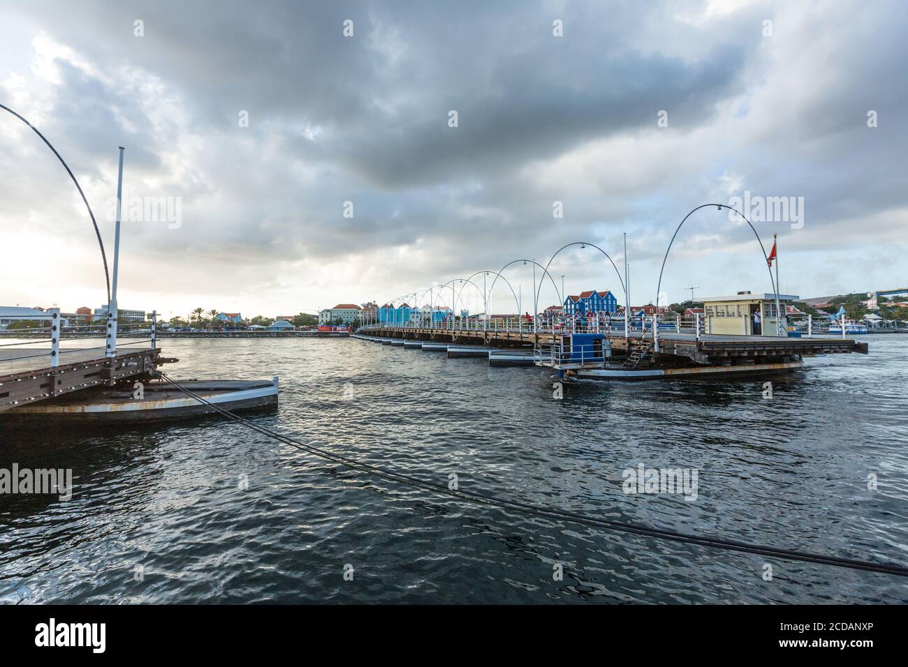 The Queen Emma Bridge is a pontoon bridge across the St. Anna Bay that ...