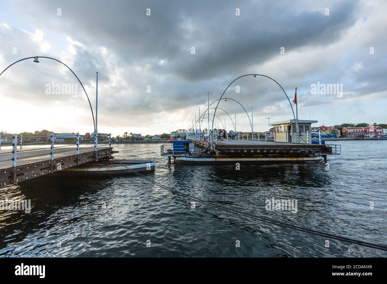The Queen Emma Bridge is a pontoon bridge across the St. Anna Bay that ...