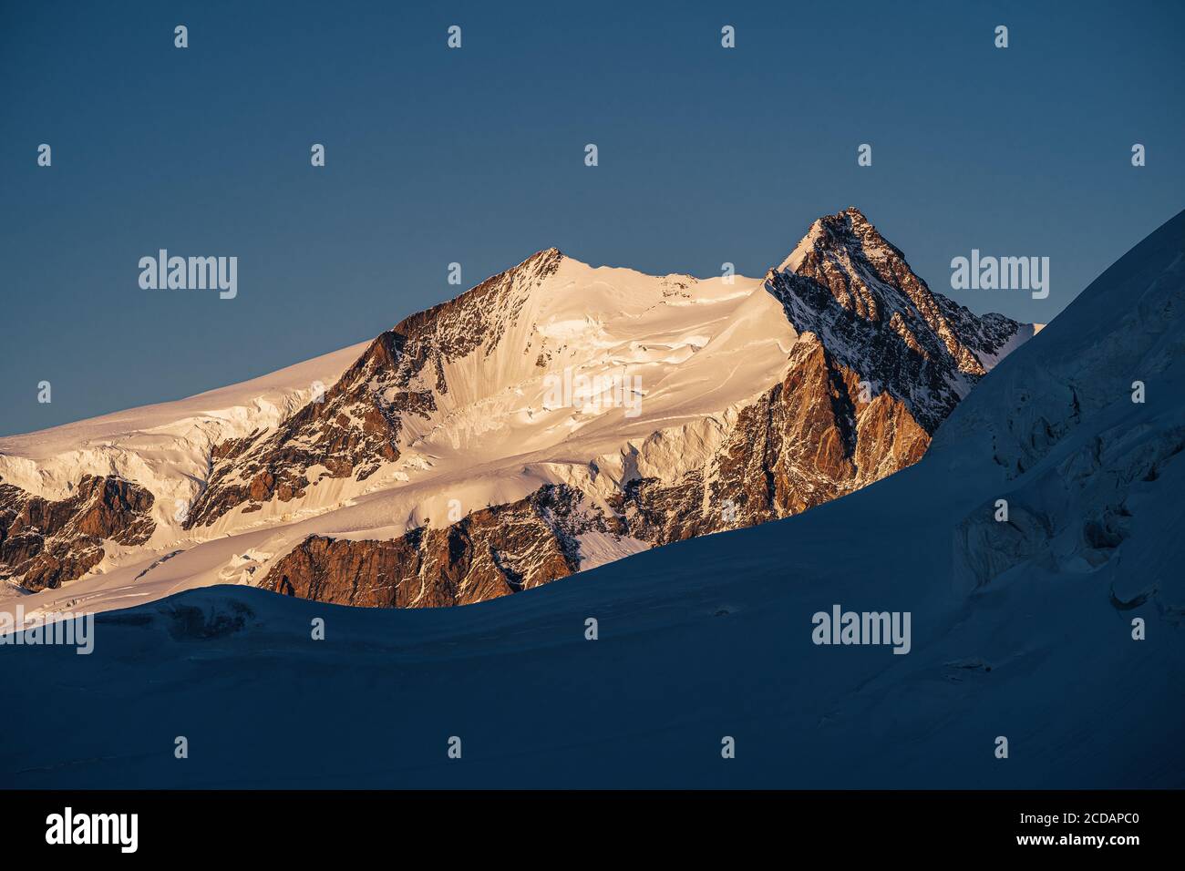 Monte Rosa glacier and summit during sunset Stock Photo - Alamy