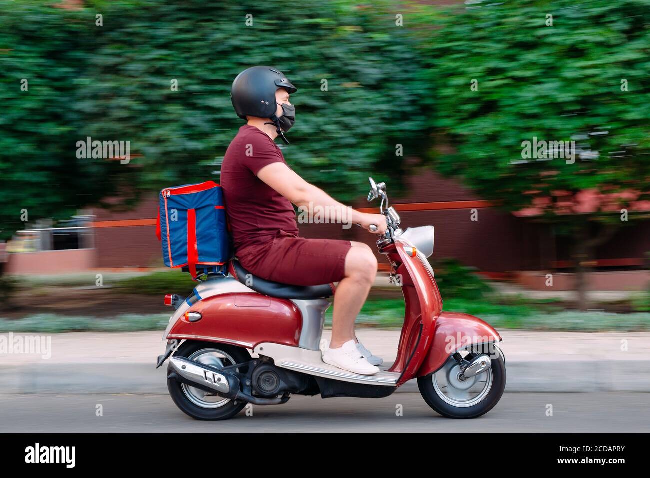 Boy delivering pizza fast food hi-res stock photography and images - Alamy