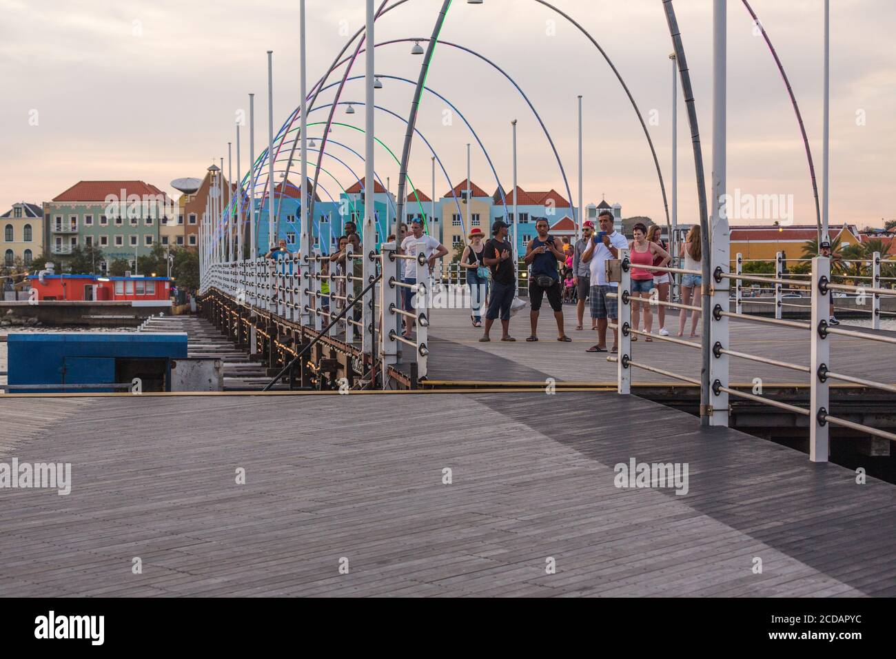 The Queen Emma Bridge is a pontoon bridge across the St. Anna Bay that ...