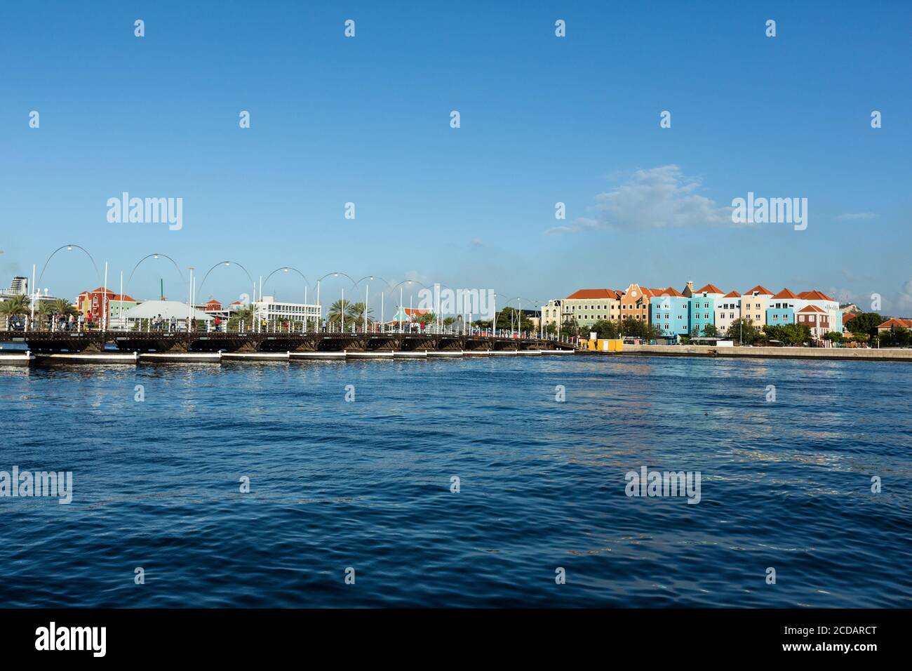 The Queen Emma Bridge is a swinging pontoon bridge originally built ...