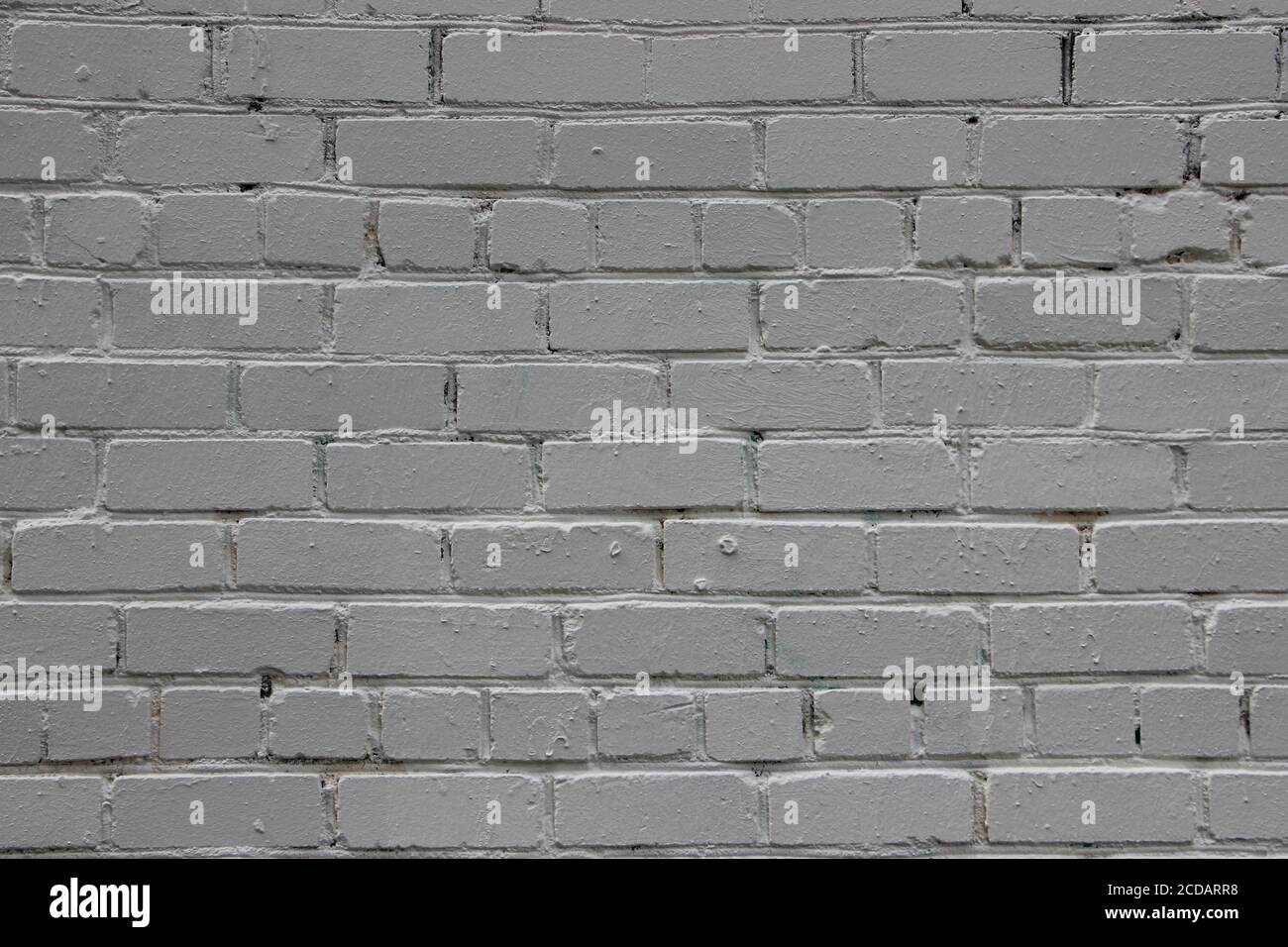 Light grey grunge brick wall background texture Stock Photo - Alamy