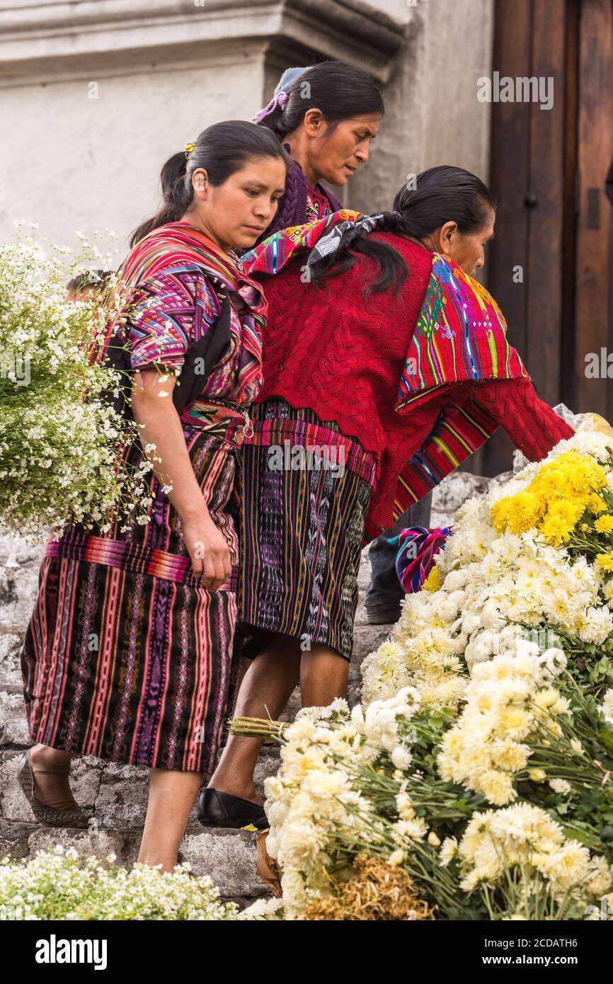 Quiche Mayan women selling flowers in the flower market on the pre ...