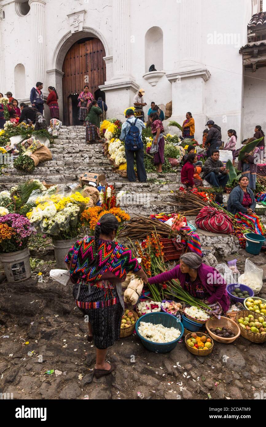 Quiche Mayan women selling flowers and fruit in the flower market on ...