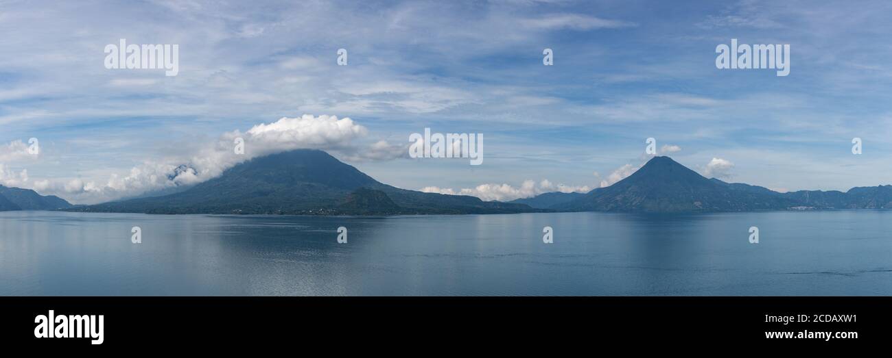 Panoramic view of Lake Atitlan, Toliman Volcano at left and San Pedro ...