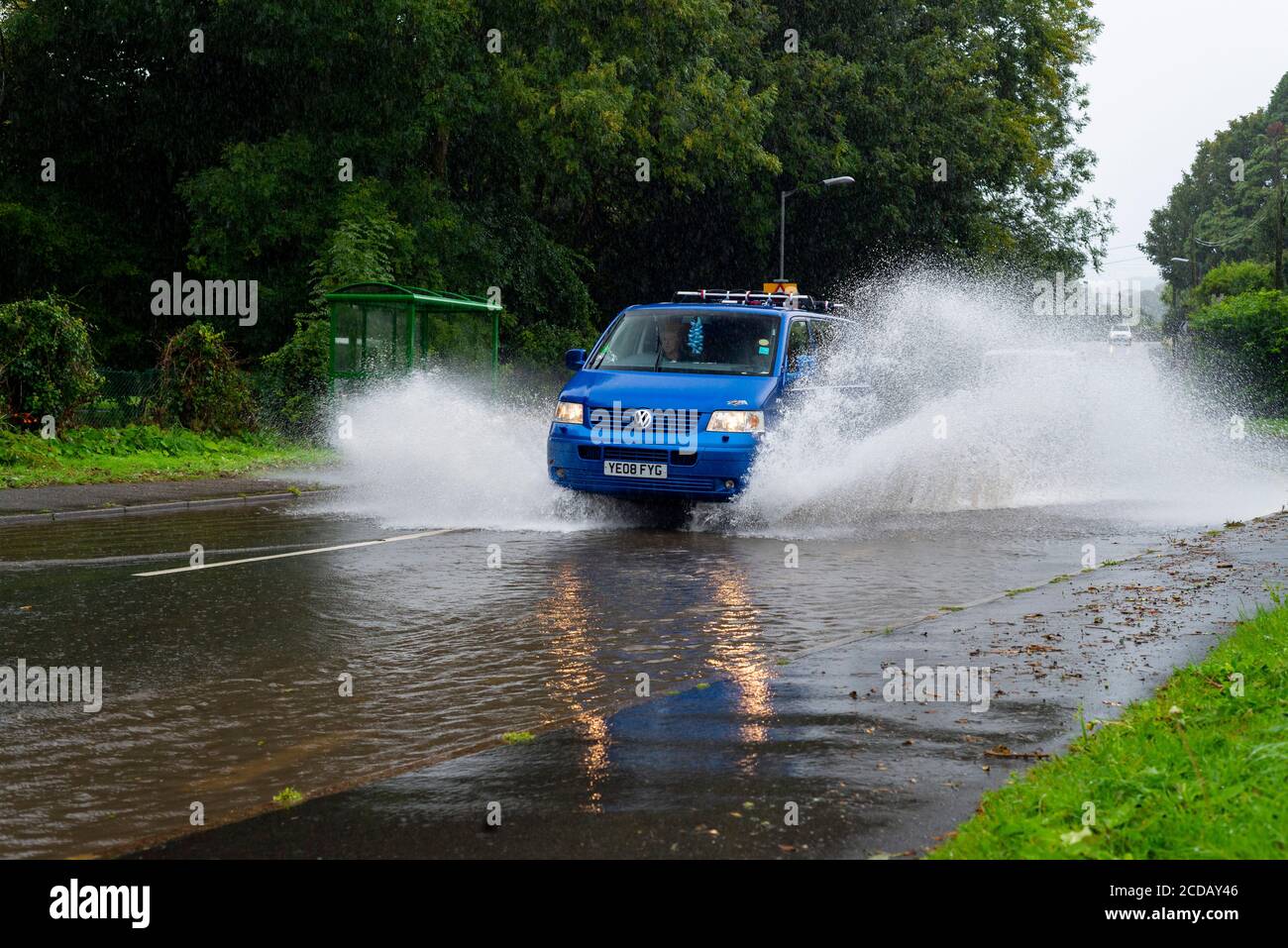 Cars driving through flood hi-res stock photography and images - Alamy
