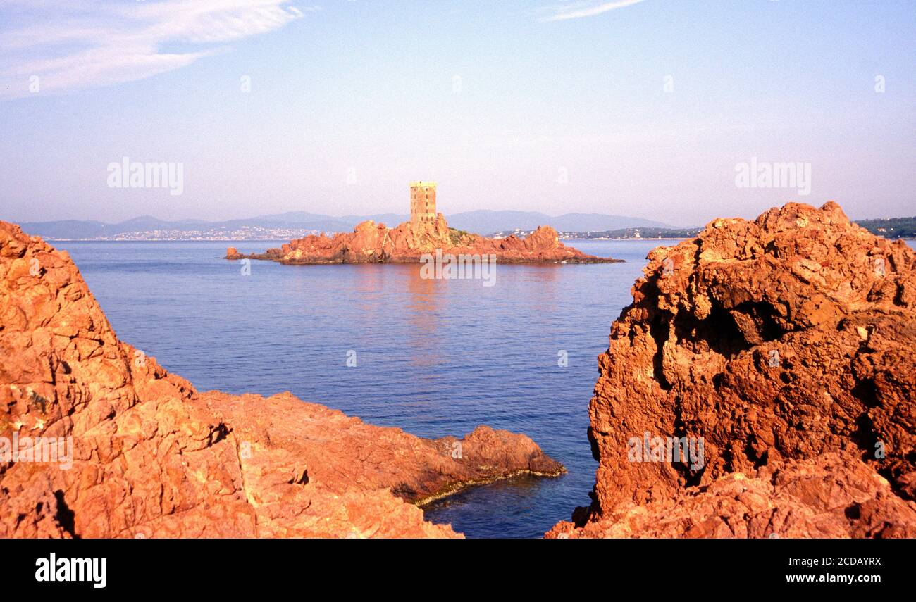 The golden island with its crenellated tower Stock Photo - Alamy