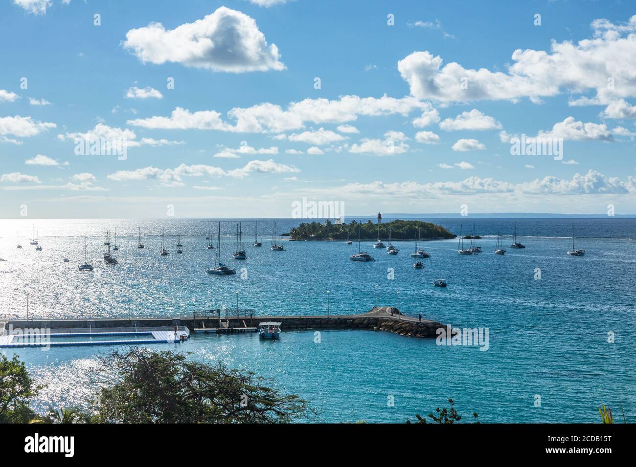 Sailboats at anchor by the Ilet Du Gosier Lighthouse as seen from ...