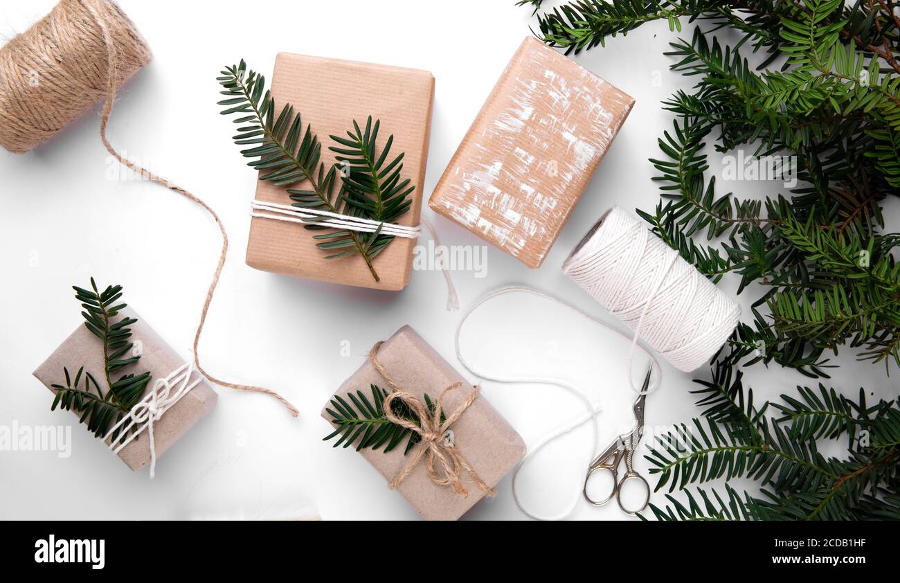 Hand made gifts for Christmas on white table Stock Photo - Alamy