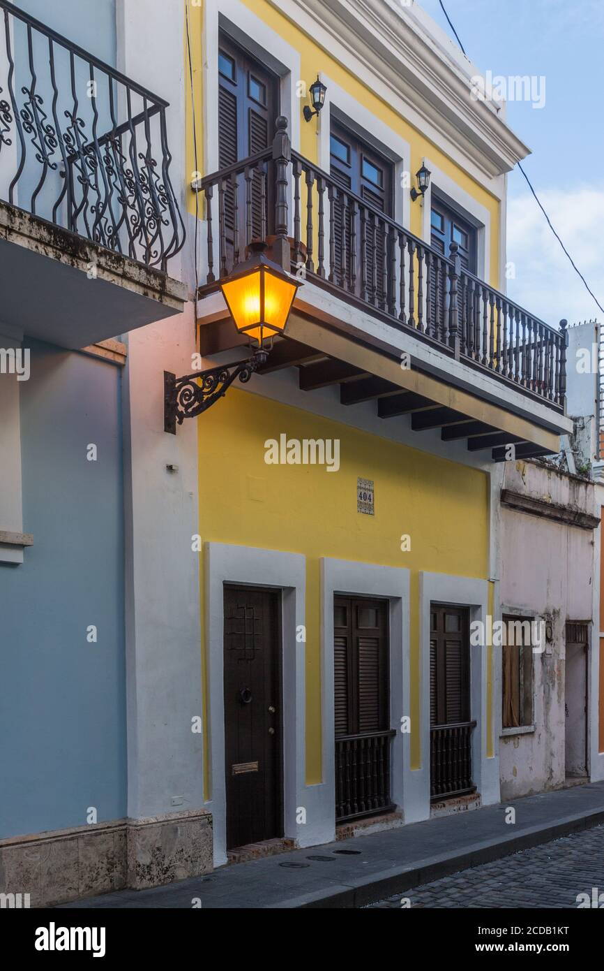 Colorfully painted houses on a narrow cobblestone street in the ...