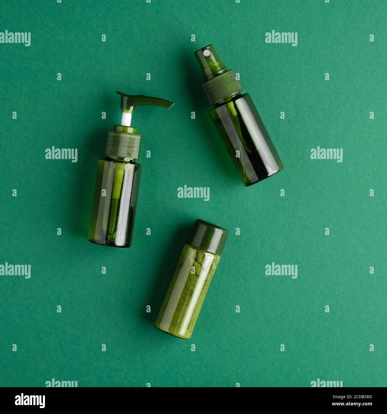 Natural skincare cosmetic bottles on green background. Bio beauty ...